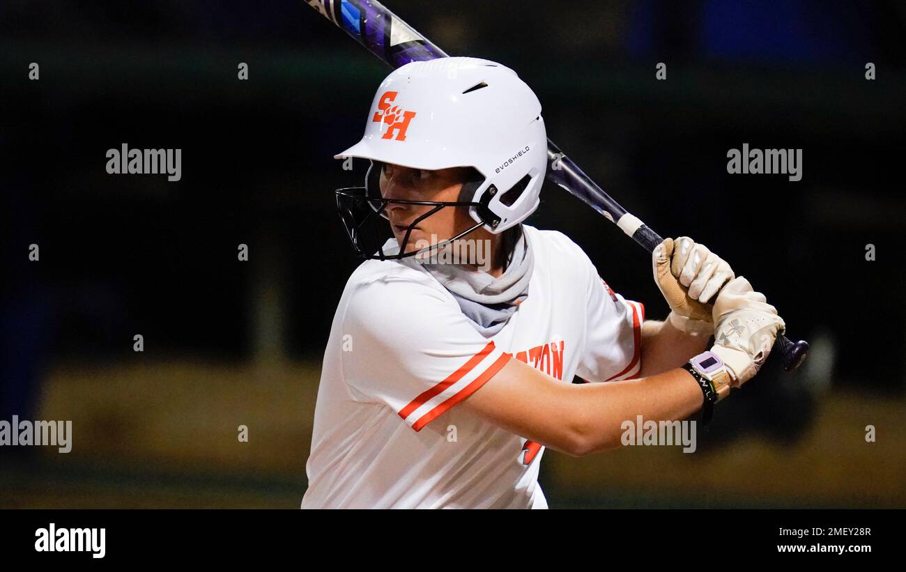 Sam Houston State infielder Ellie Grill (4) awaits the pitch while ...