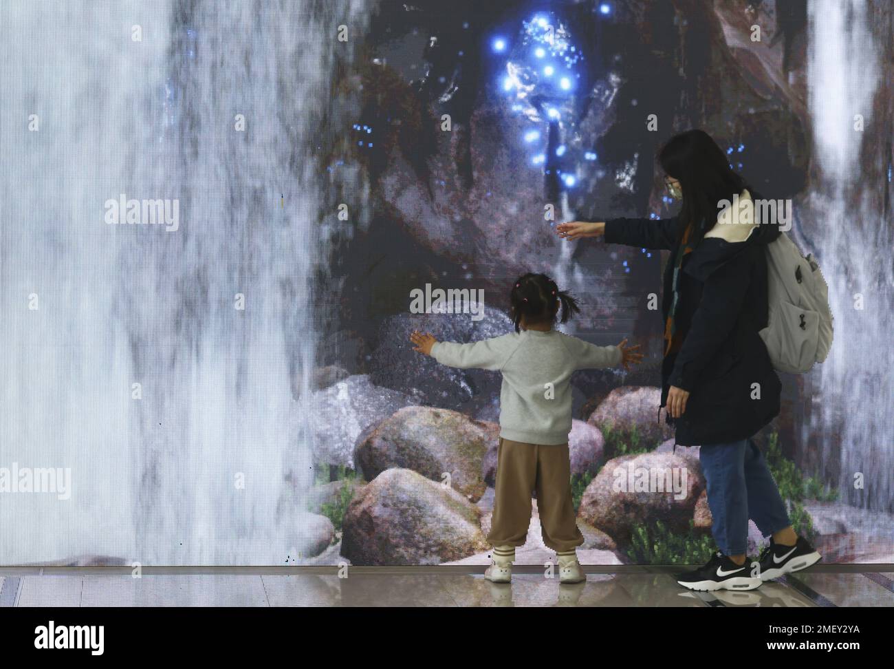 A big-screen waterfall with a motion sensor at Hong Kong International ...