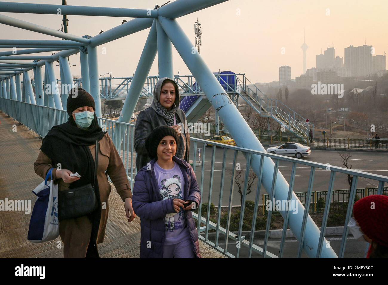 People wear face mask to protect against the pullotion due to the high ...