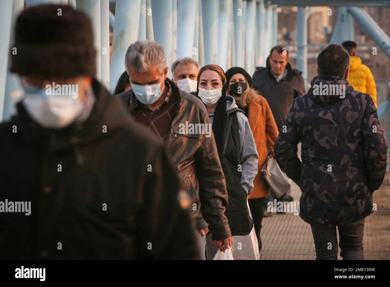 People wear face mask to protect against the pullotion due to the high ...
