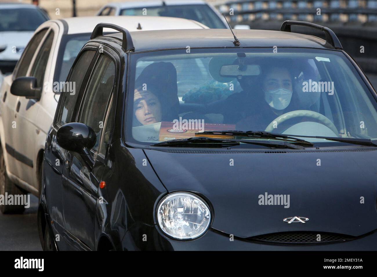 People wear face mask to protect against the pullotion due to the high ...