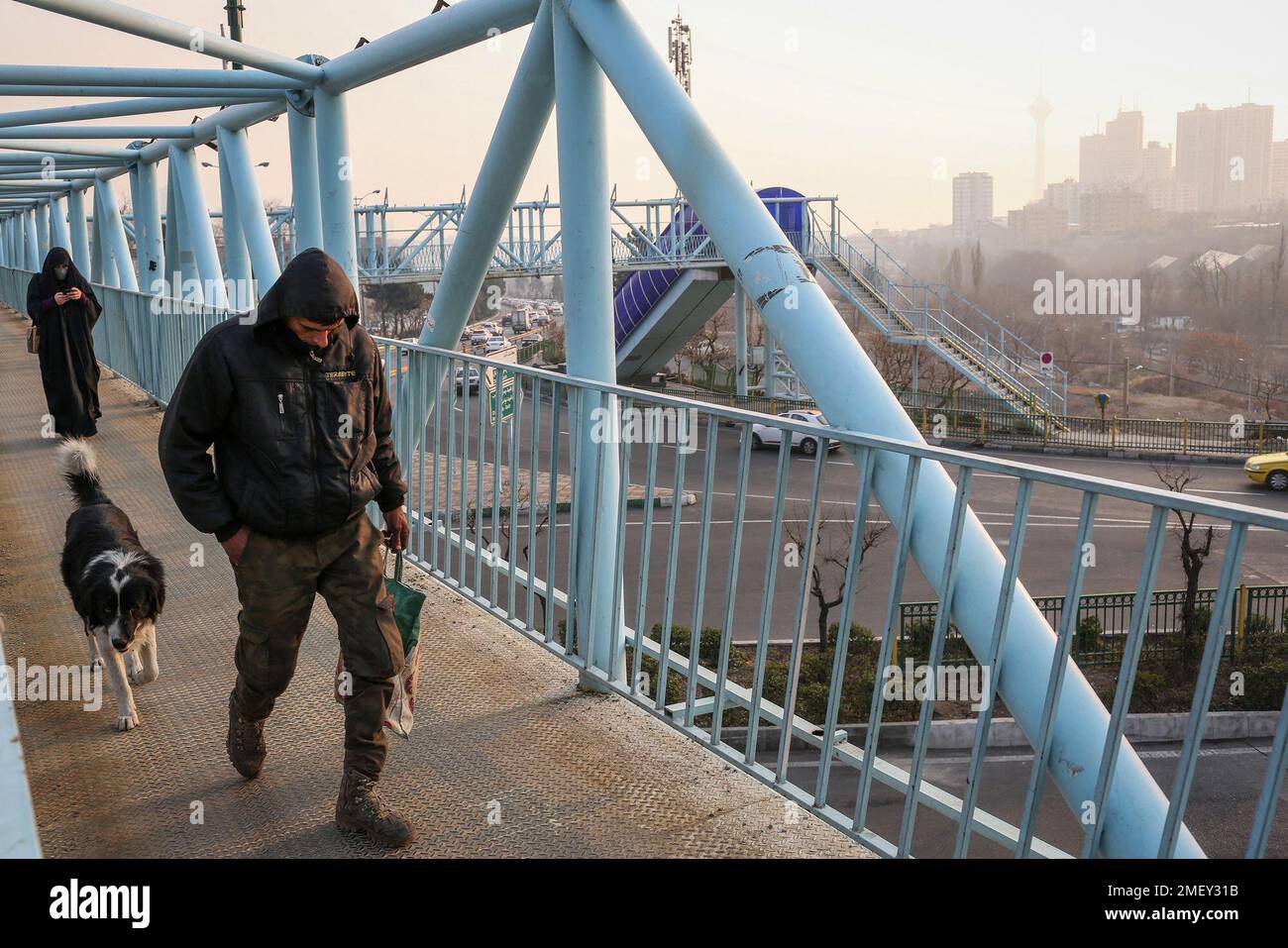 People wear face mask to protect against the pullotion due to the high ...