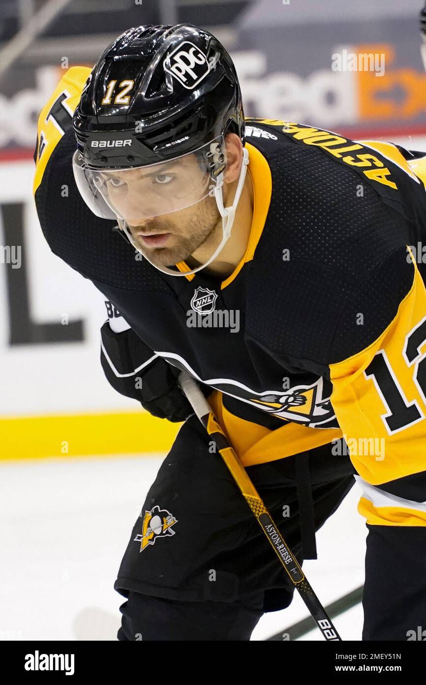 Pittsburgh Penguins' Zach Aston-Reese (12) plays against the New Jersey ...