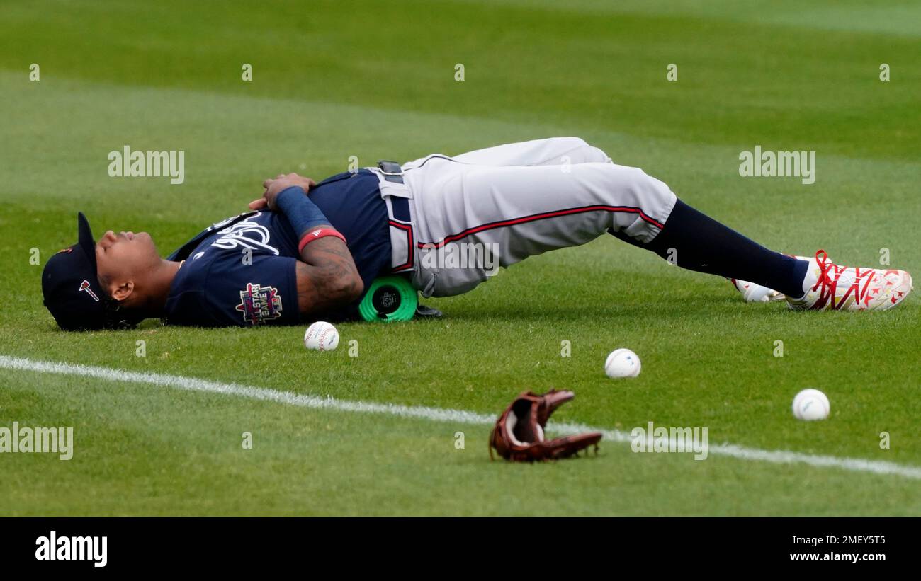 Atlanta Braves' Cristian Pache stretches before a spring training ...