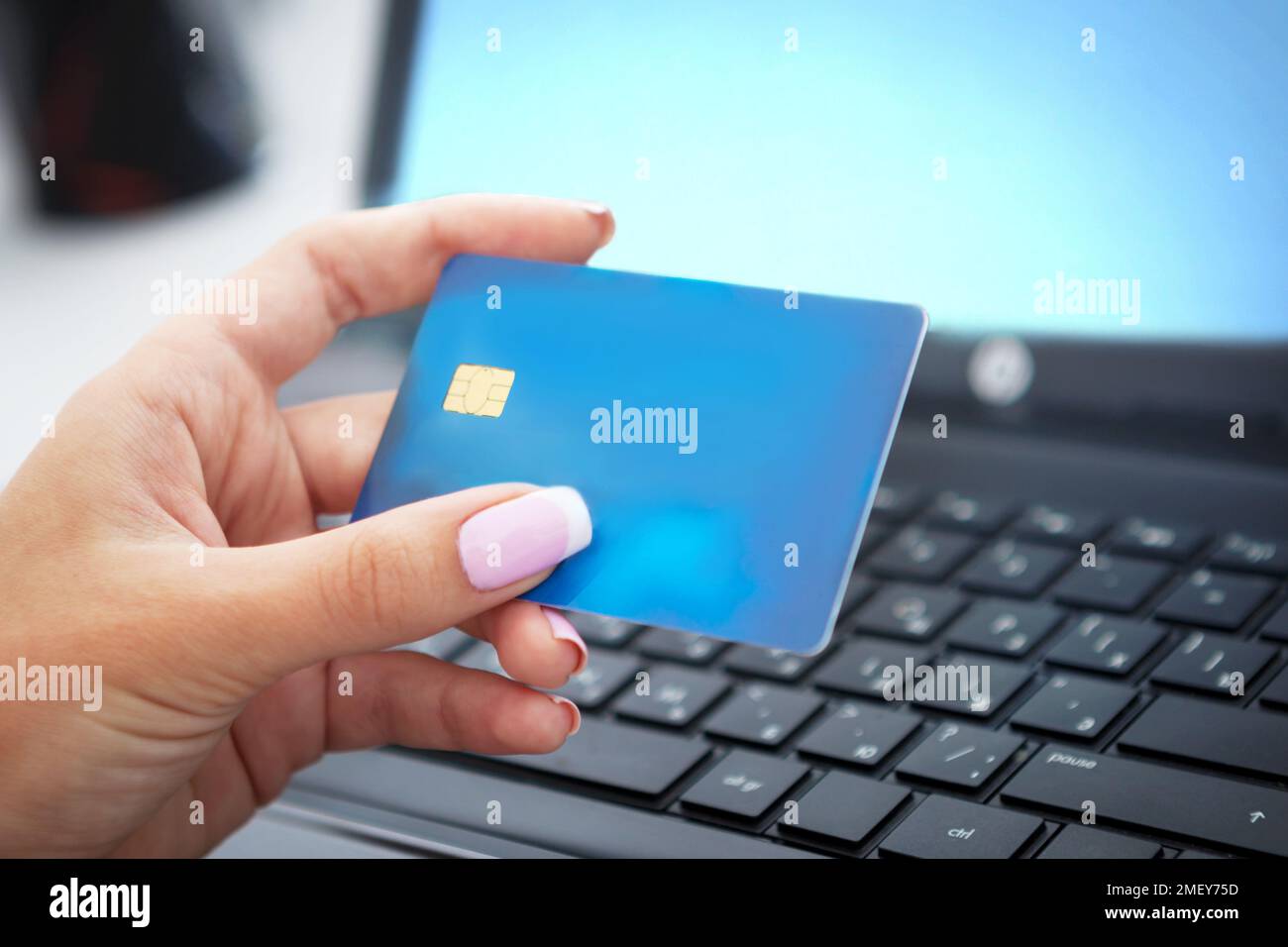 Hand holding bank card hi-res stock photography and images - Alamy