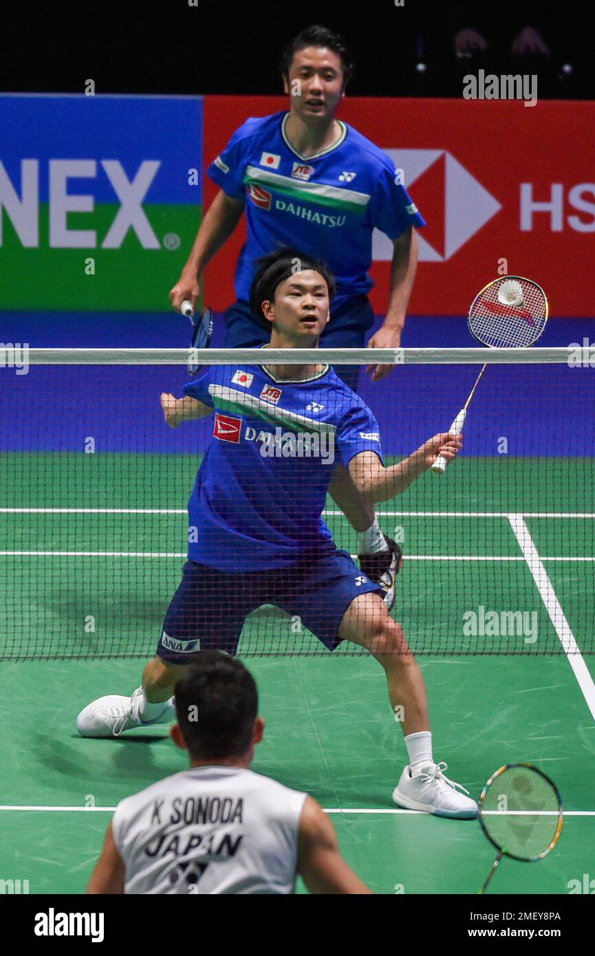 Japan's Yuta Watanabe and Hiroyuki Endo, background, return a shot to ...