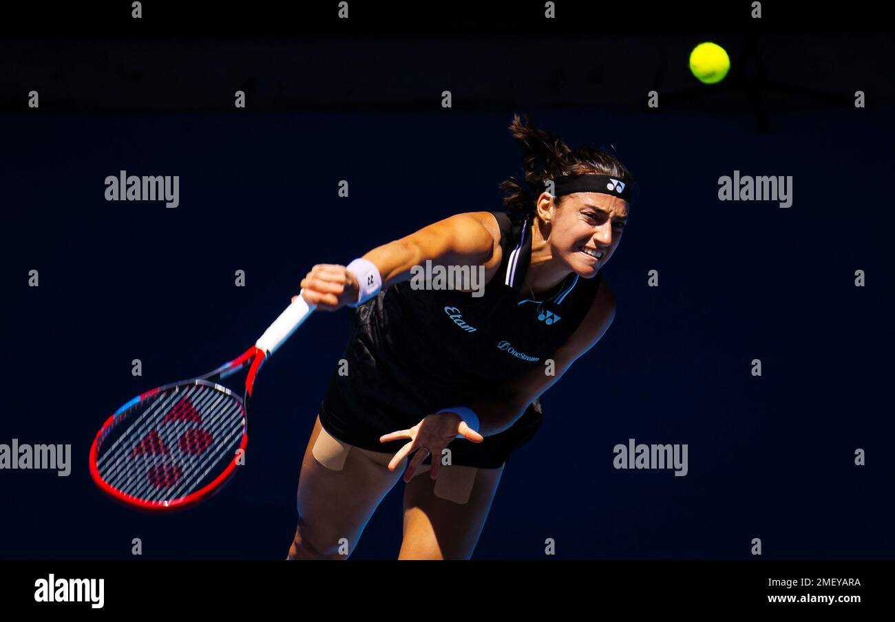 Caroline Garcia of France in action against Magda Linette of Poland ...