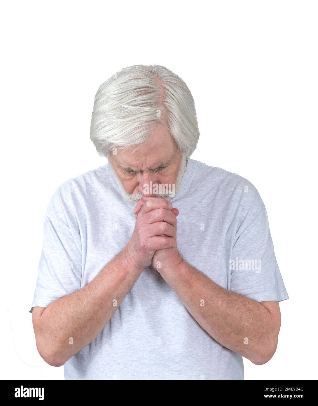 Vertical shot of an old man deep in thought or prayer. White background ...