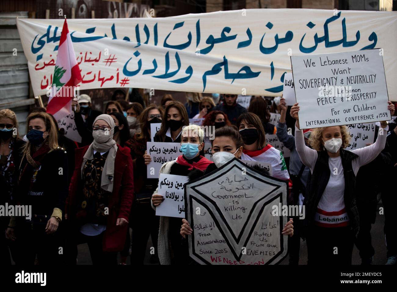 Protesters participate in a march against the political leadership they ...