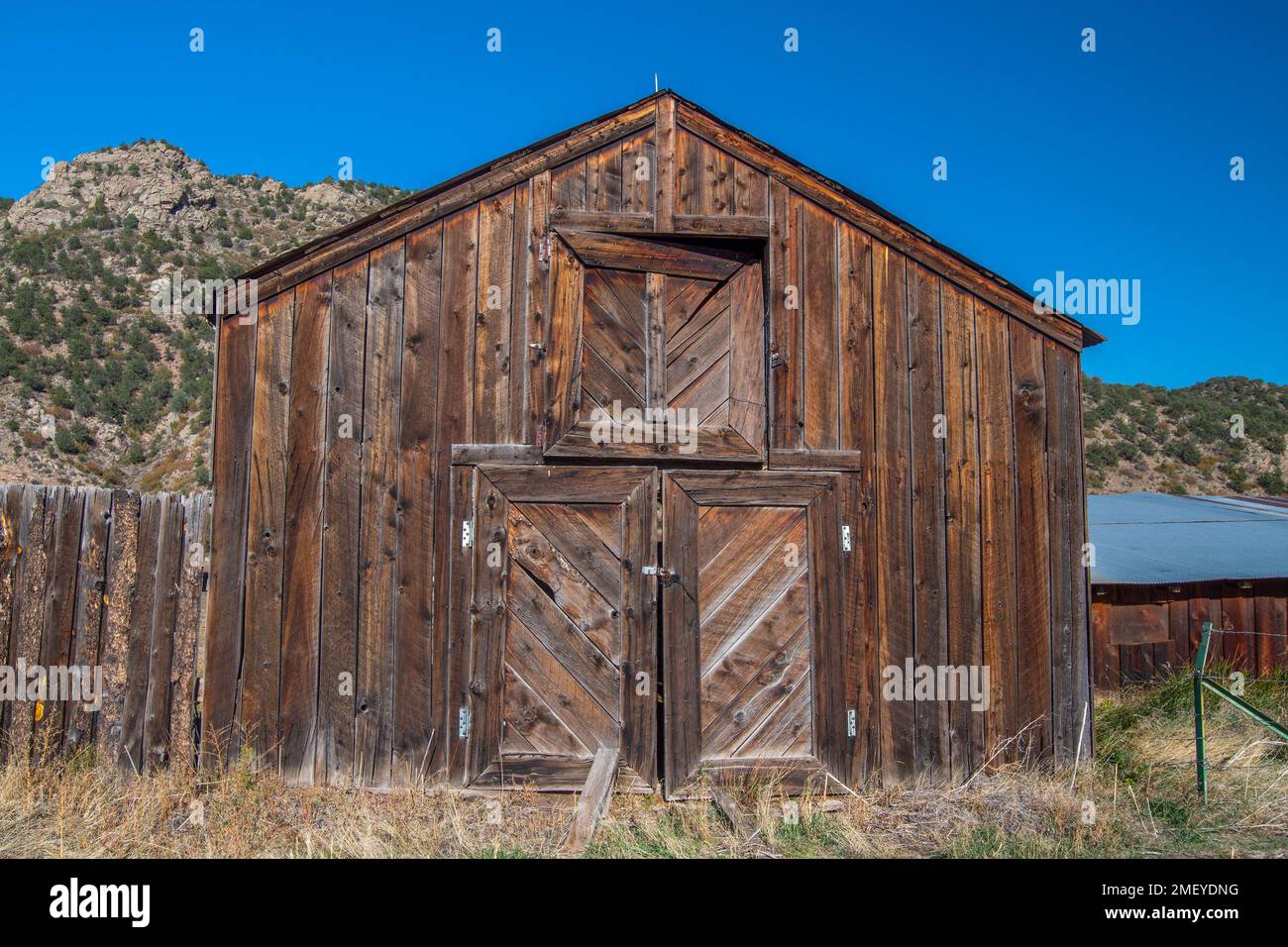 Doorway entrance to an old weathered barn near the fascinating town of ...