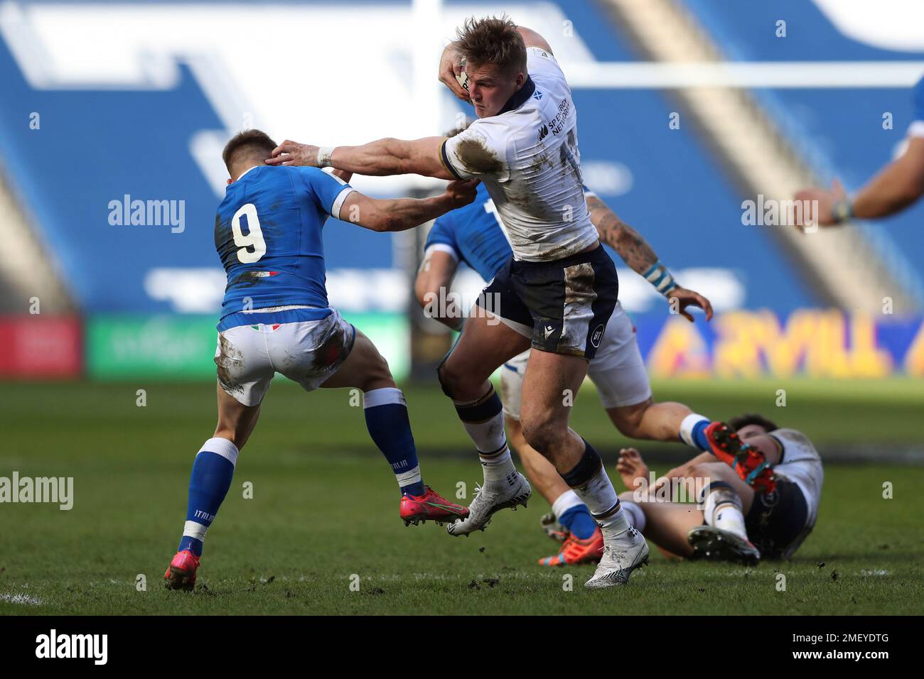 Scotland's Duhan van der Merwe, right, is tackled by Italy's Stephen ...