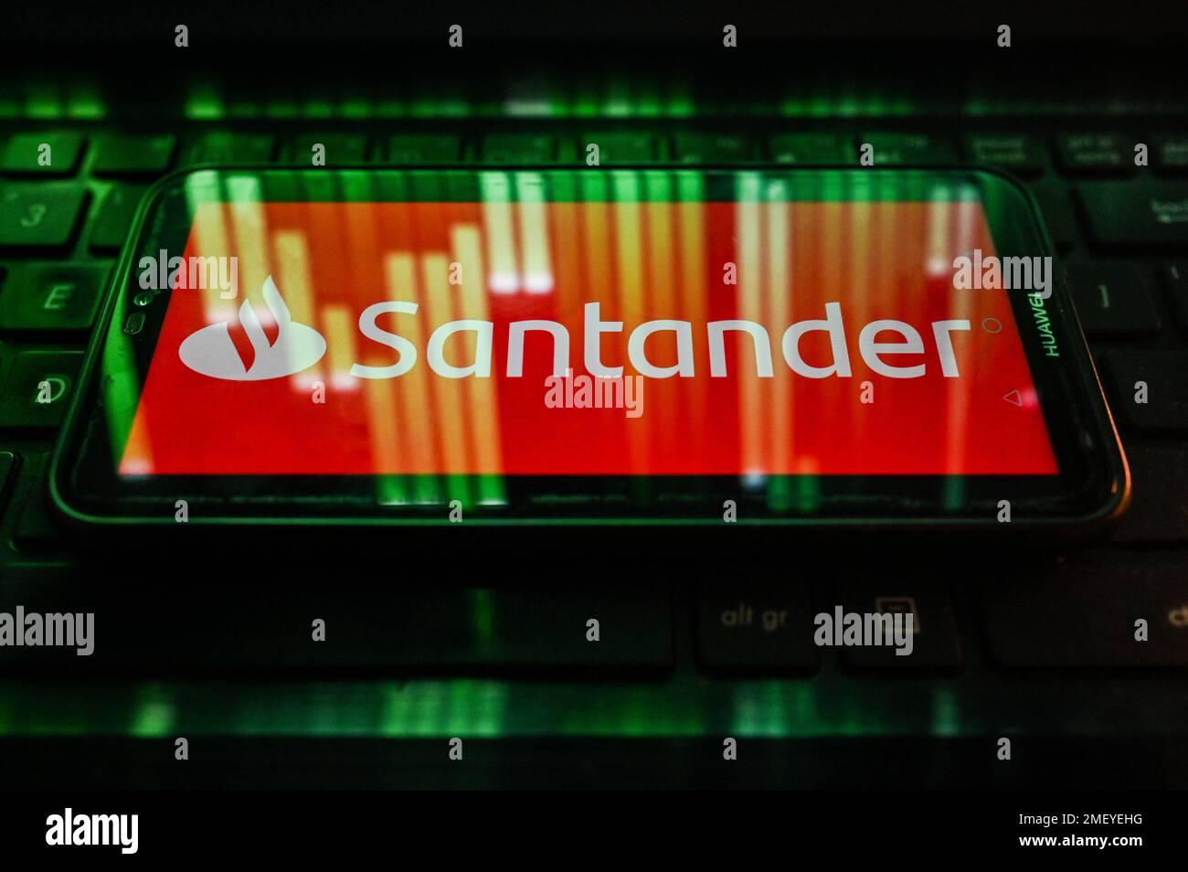 In this photo illustration, a Santander bank logo is displayed on a ...