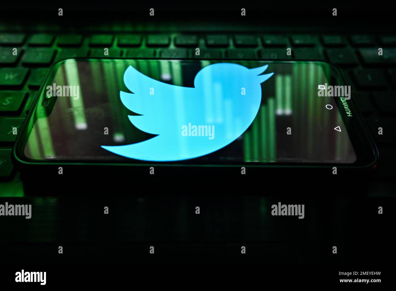 In this photo illustration, a Twitter logo is displayed on a smartphone ...