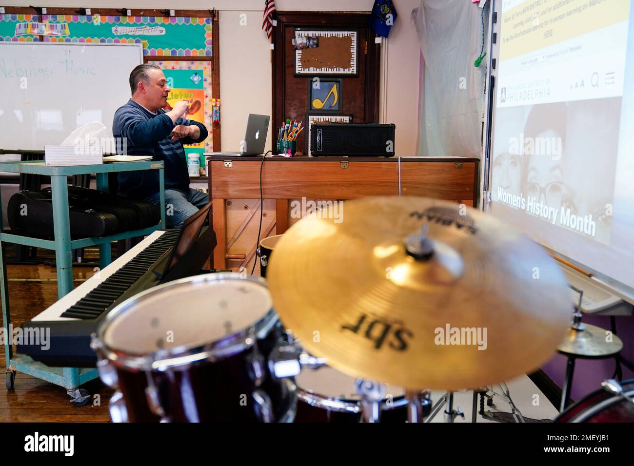 Music teacher Marc Dulberg teaches his students virtually ahead of ...