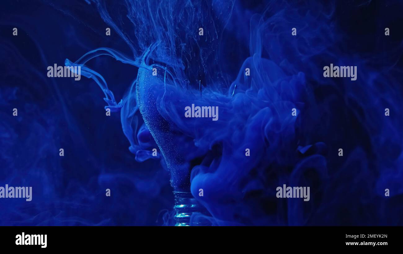 Broken lamp smog cloud blue light bulb on dark Stock Photo - Alamy