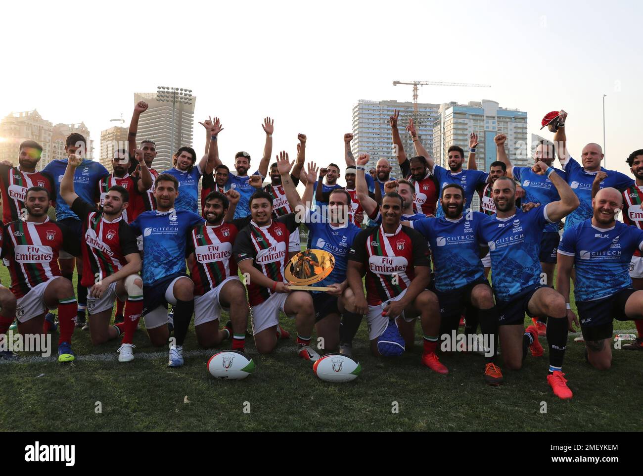 UAE and Israel rugby players celebrate with each other after a friendly ...