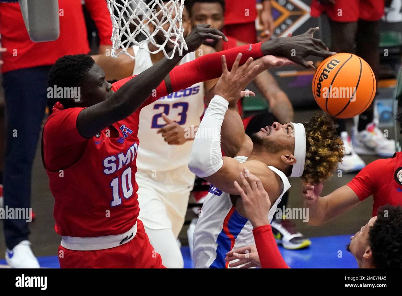 SMU forward Yor Anei (10) blocks a shot by Boise State guard Marcus ...
