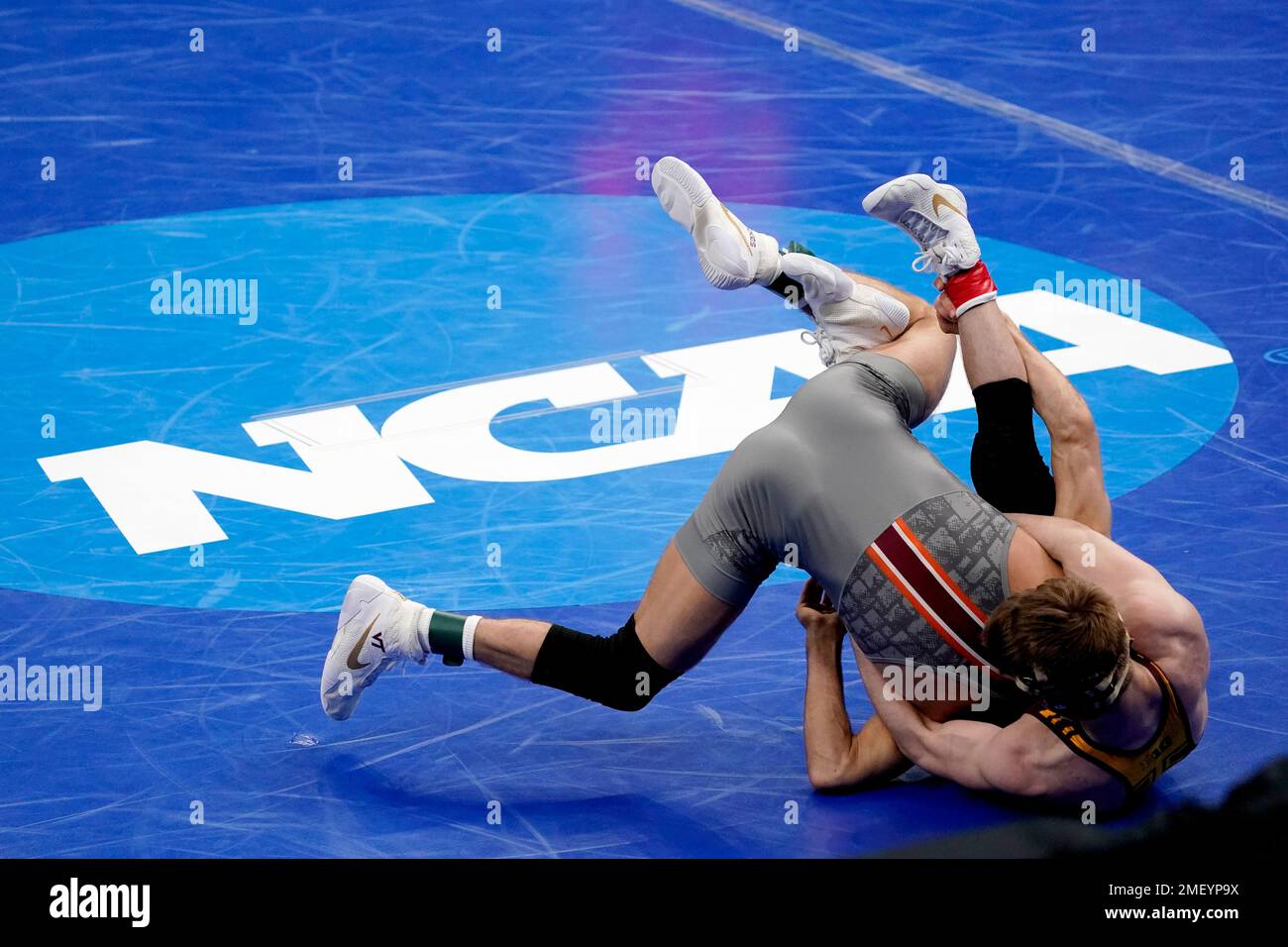 Virginia Tech's Sam Latona, left, takes on Minnesota's Patrick McKee ...