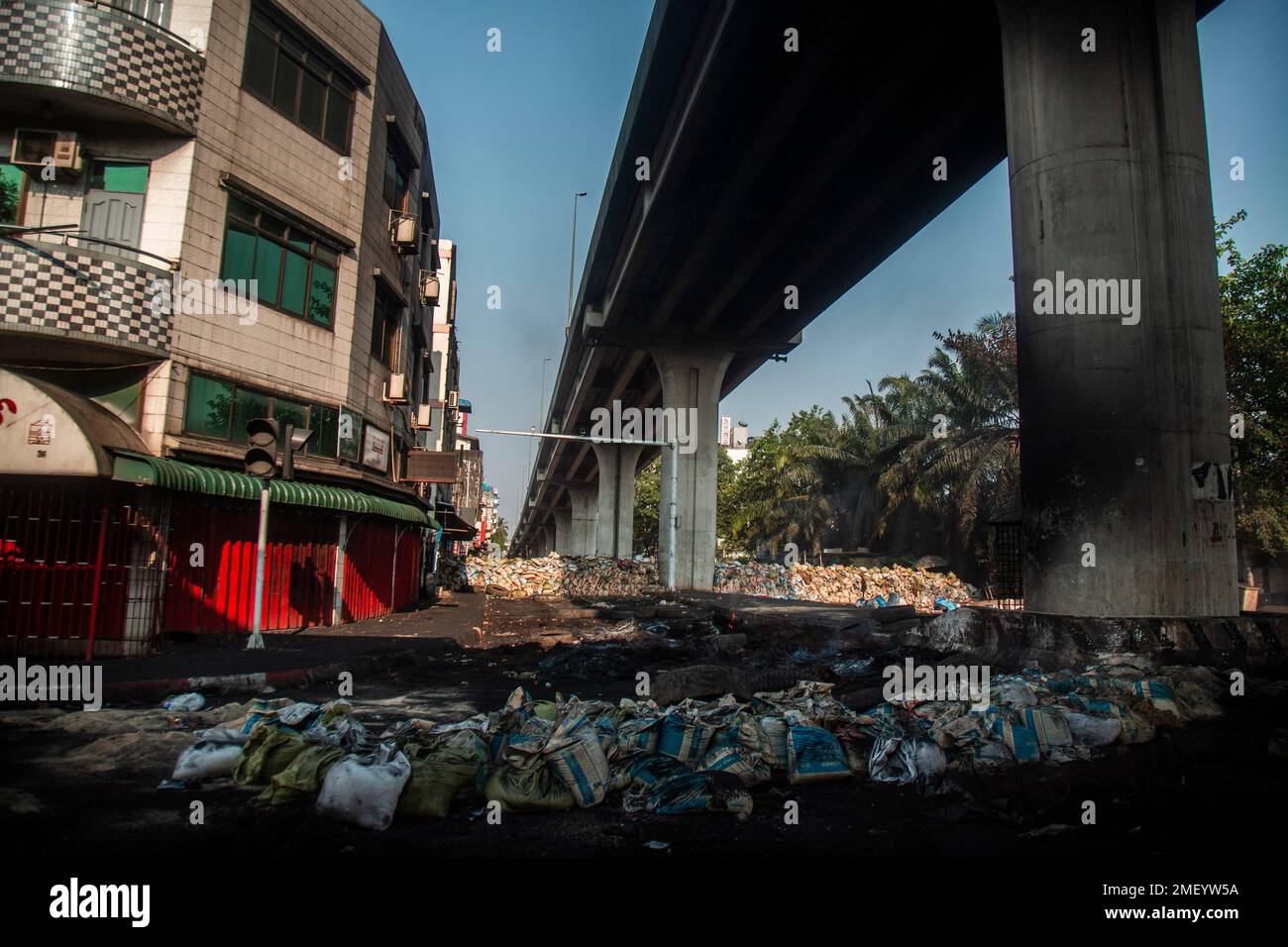 Improvised barricades installed by anti-coup protesters to secure a ...