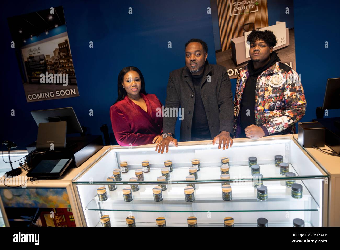 Roland Conner, son Darius, and wife Patricia are photographed at the ...