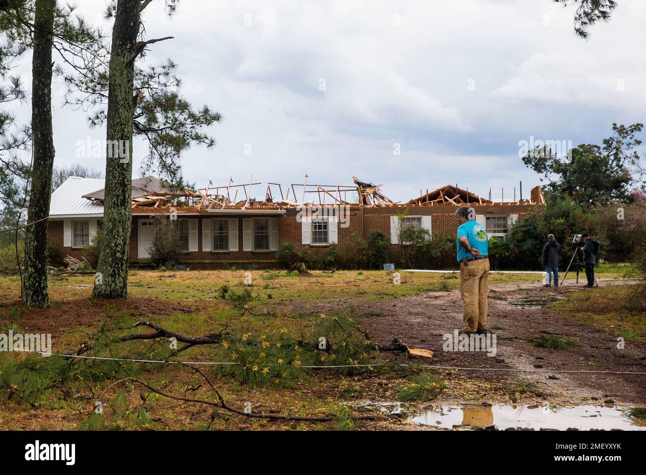Bystanders look on at a residence on Old Greensboro Road where Ryan ...