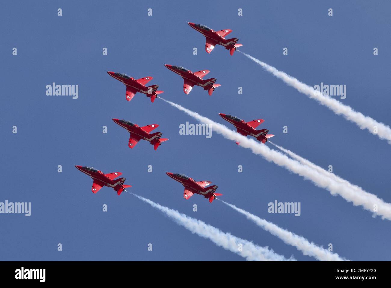 A low angle shot of the RAF Red Arrows at RIAT 2022 Fairford in the UK ...