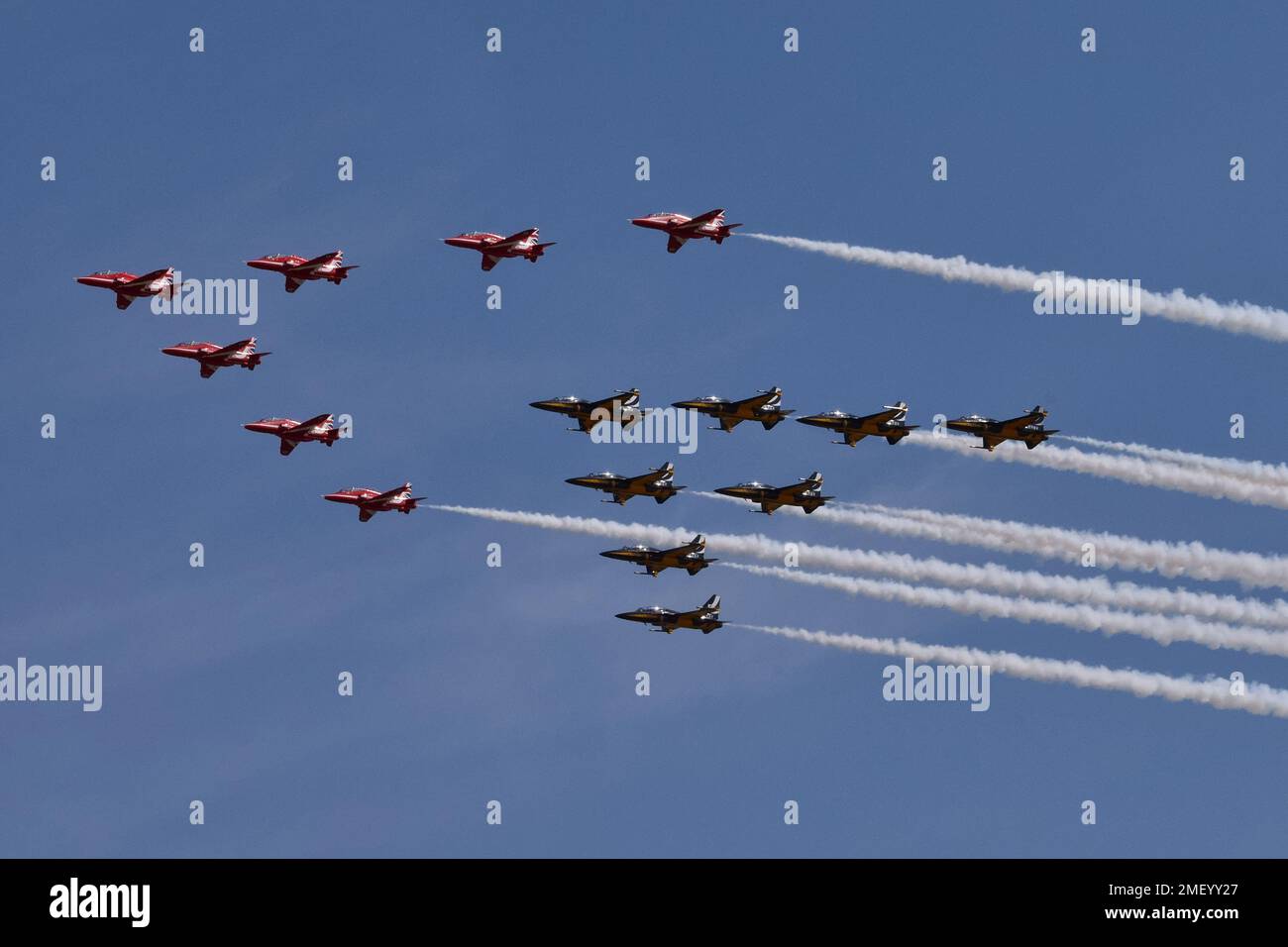 A low angle shot of the RAF Red Arrows at RIAT 2022 Fairford with The ...