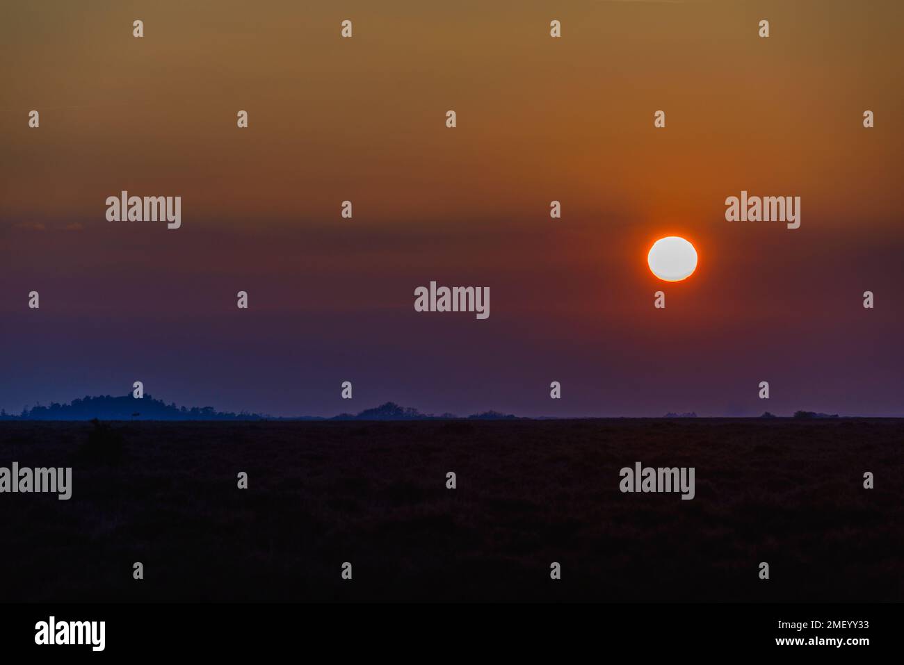 Sunset landscape, setting red sun Stock Photo - Alamy
