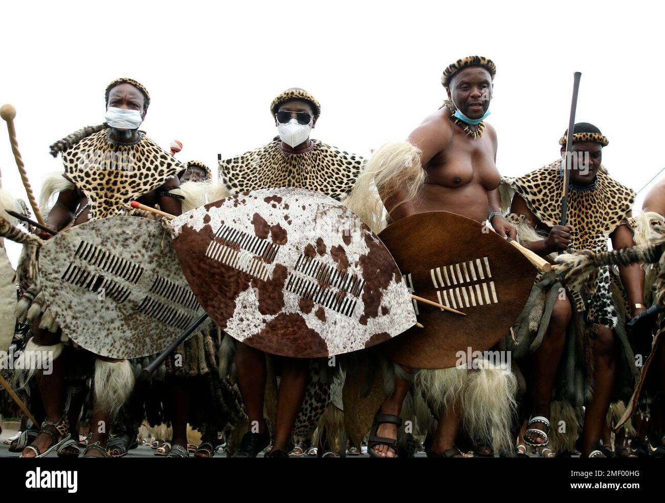 Zulu men in traditional dress gather in Mongoma, South Africa ...