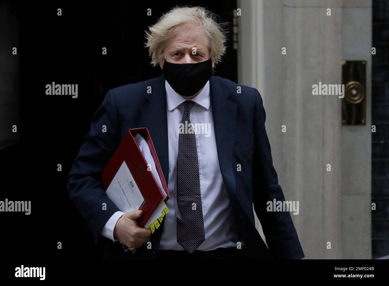 Britain's Prime Minister Boris Johnson leaves Downing Street to attend ...