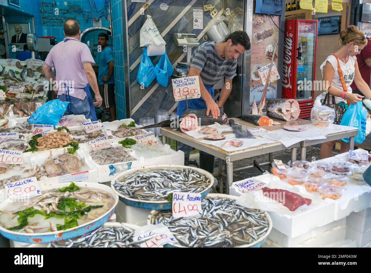 Fish monger at fish market in Naples, Italy Stock Photo - Alamy