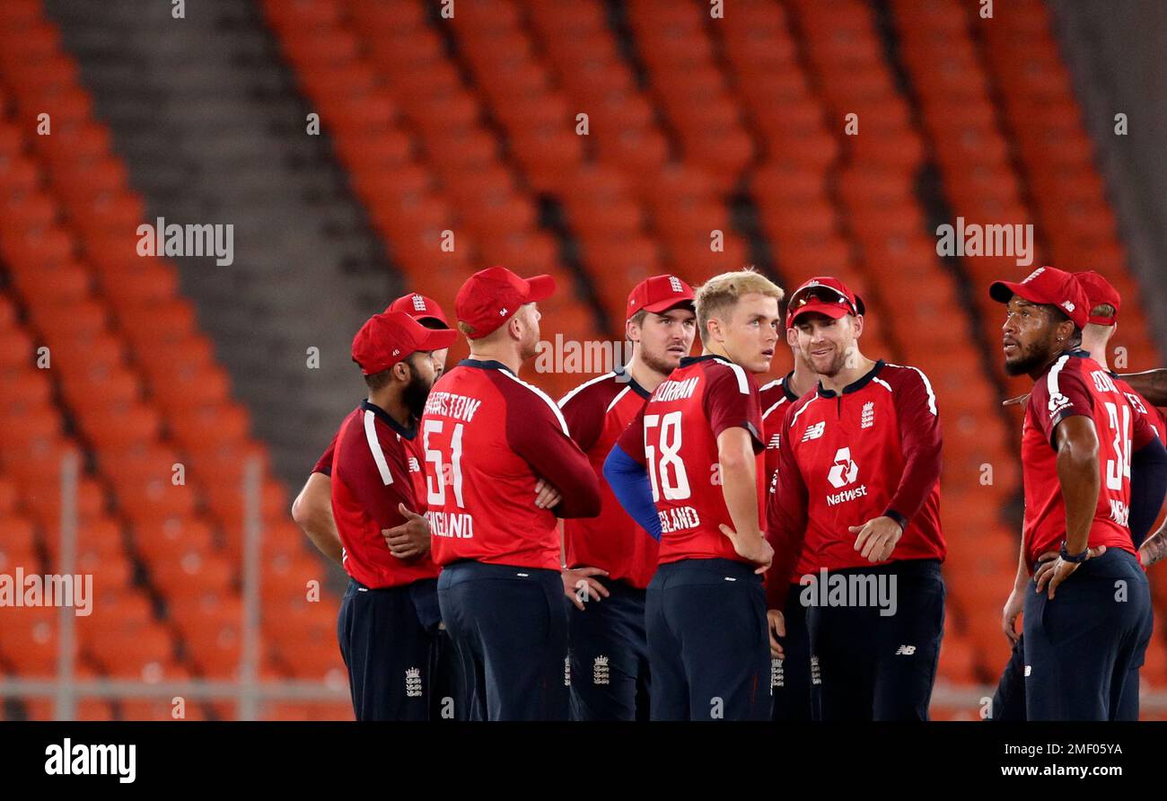 England's Sam Curran, center without cap, celebrates the wicket of ...