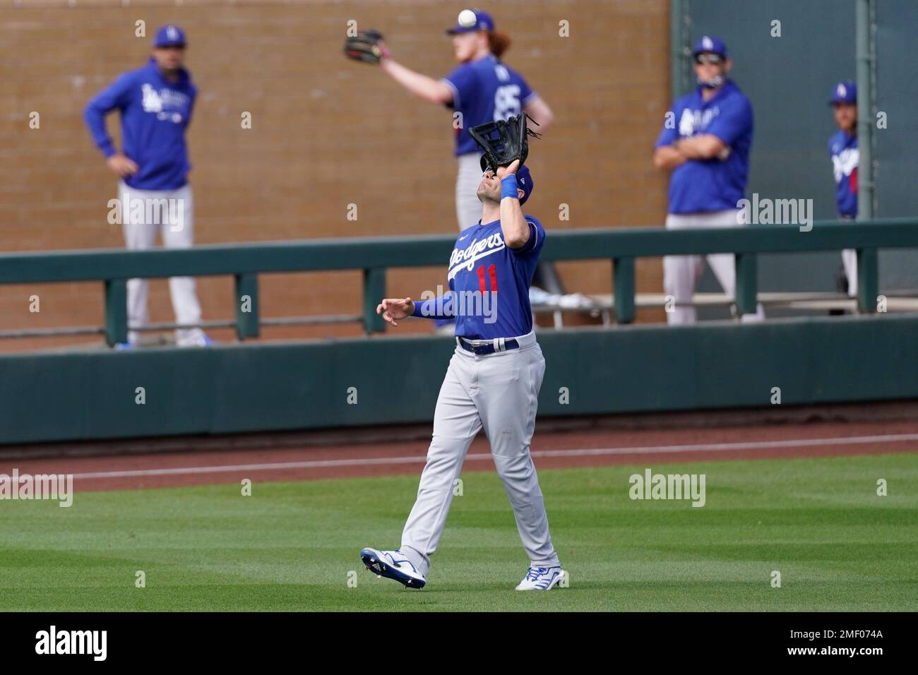 Los Angeles Dodgers left fielder A.J. Pollock (11) catches a fly ball ...