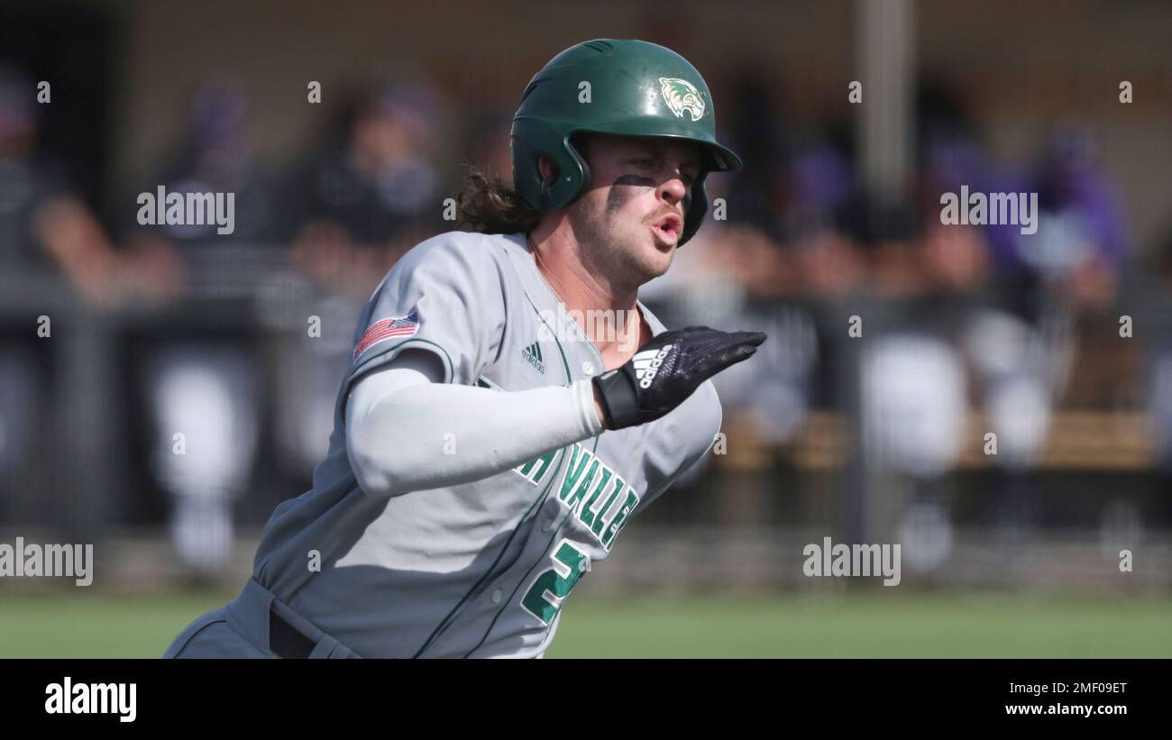 Utah Valley's Kade Poulsen runs to first base during an NCAA baseball ...