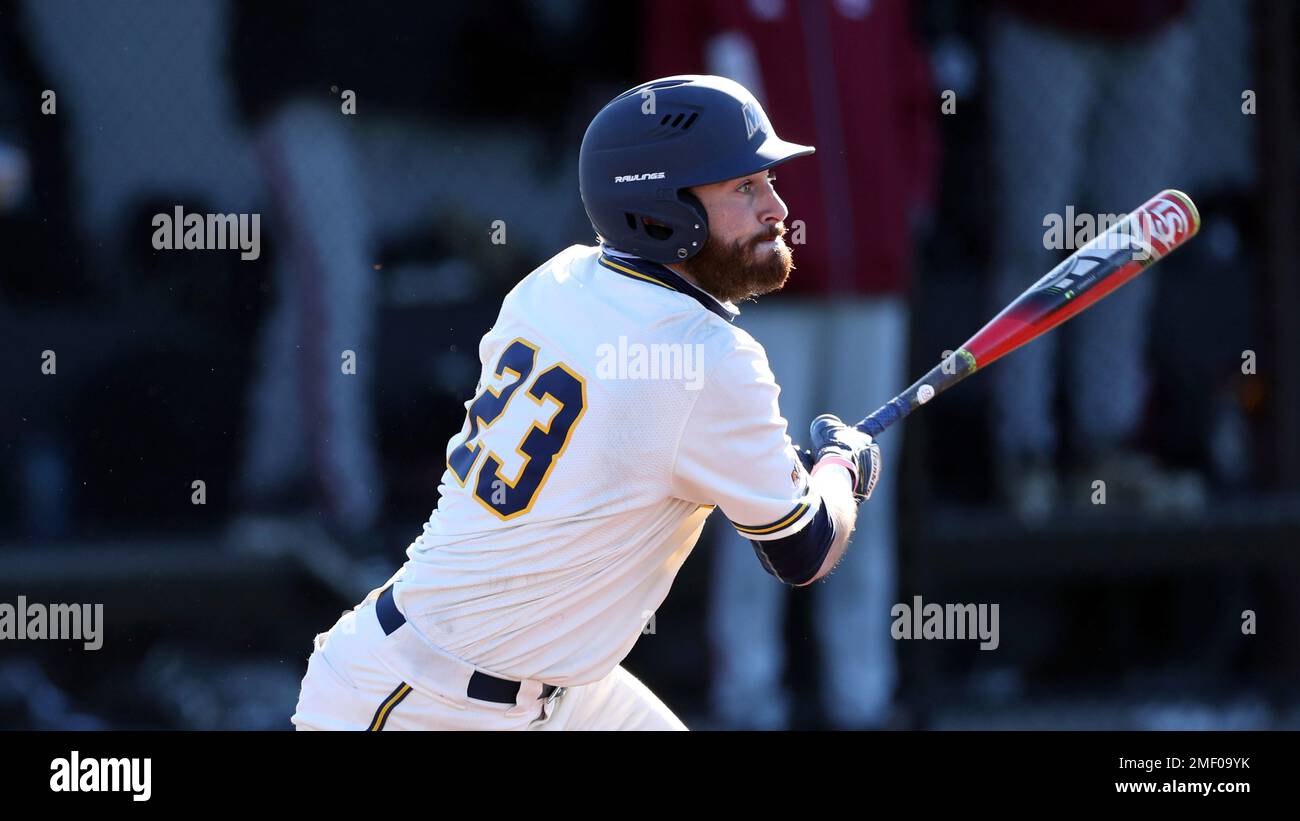 Merrimack infielder Joey Porricelli (23) bats during an NCAA baseball ...