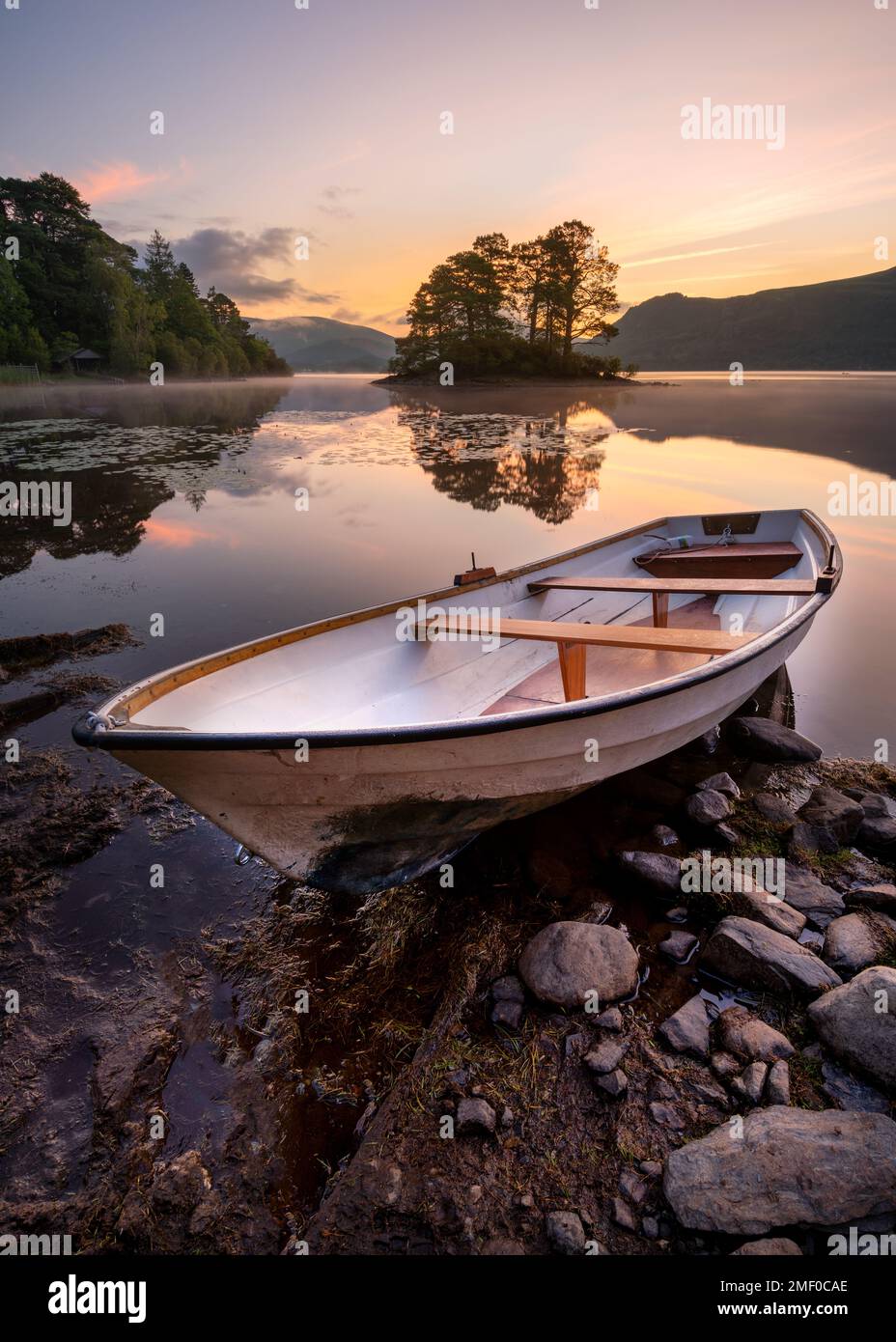 Beautiful Derwentwater sunrise with rowing boat, Lake District, UK ...