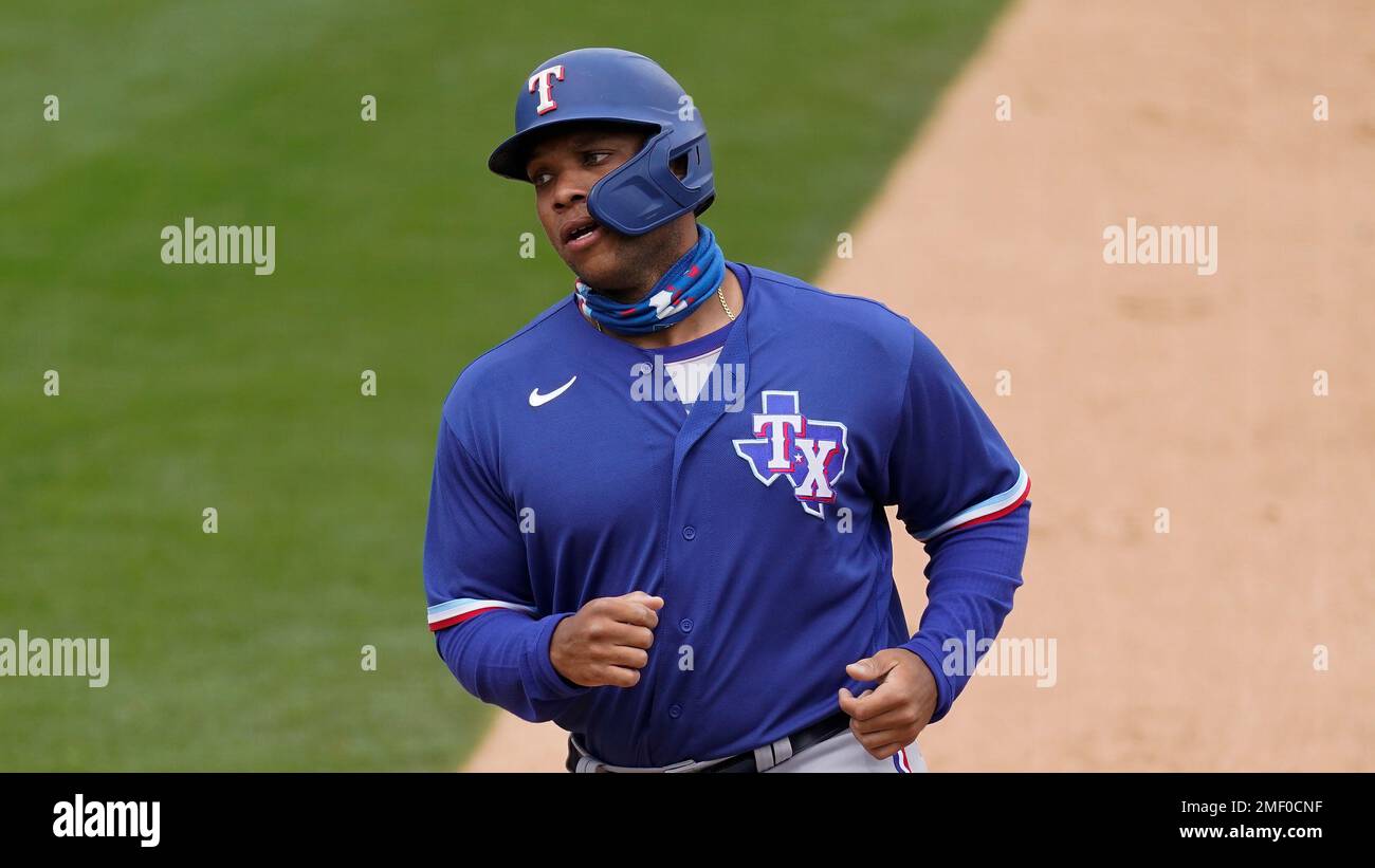 Texas Rangers first baseman Curtis Terry scores during a spring ...