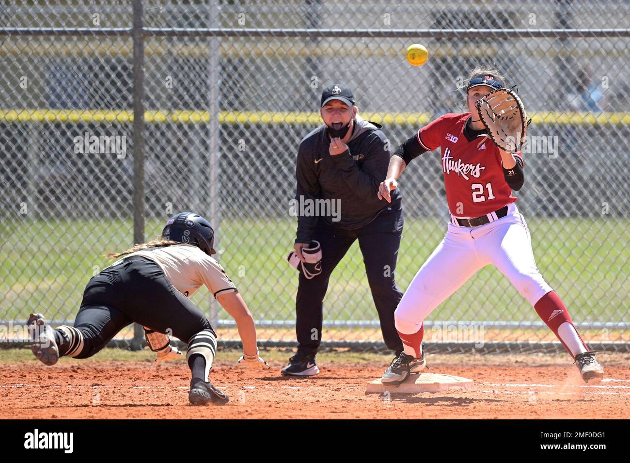 Nebraska's Sarah Yocom (21) gets the double play at first base on ...