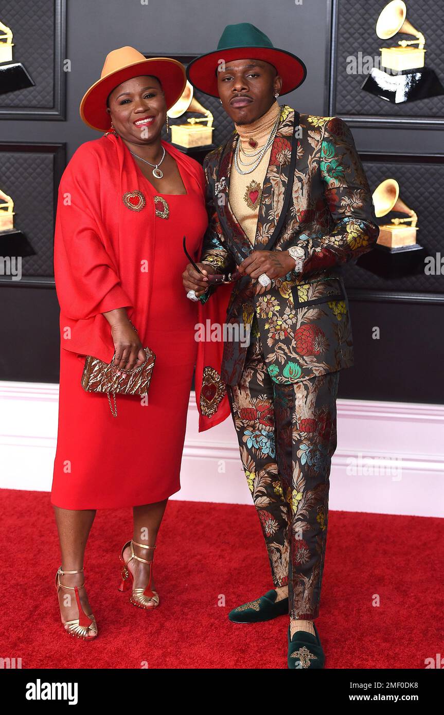 DaBaby, right, and his mother, Linda, arrive at the 63rd annual Grammy ...
