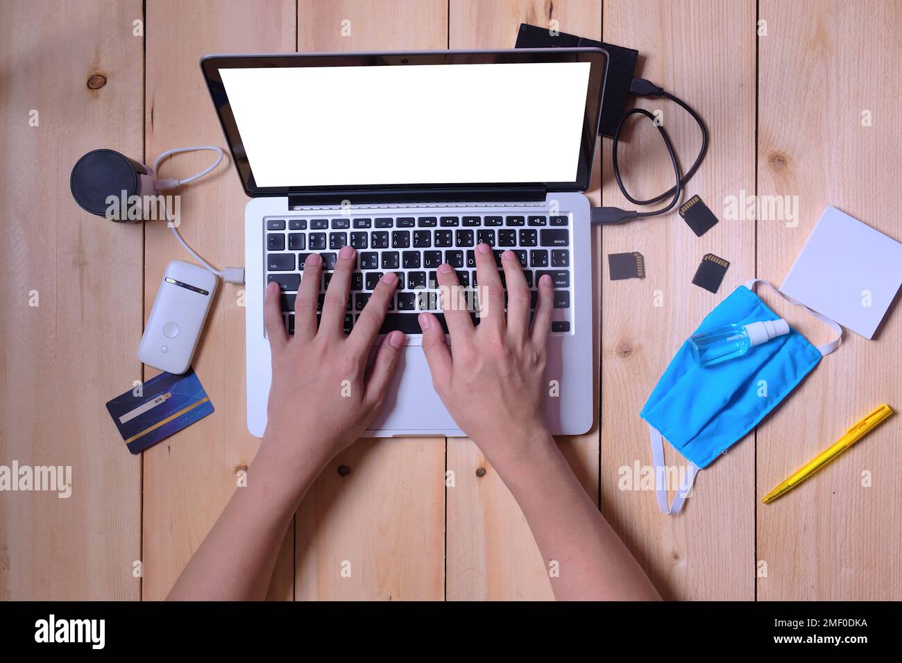 Close-up hands man who typing keyboard on computer laptop portable for ...