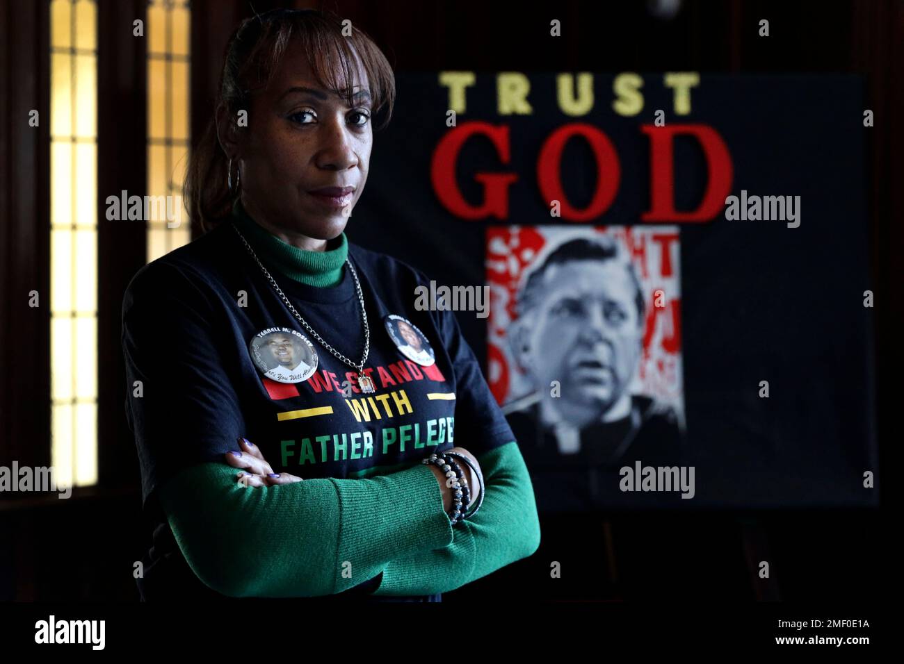 Activist Pam Bosley poses for a portrait infront of a portraiture of ...