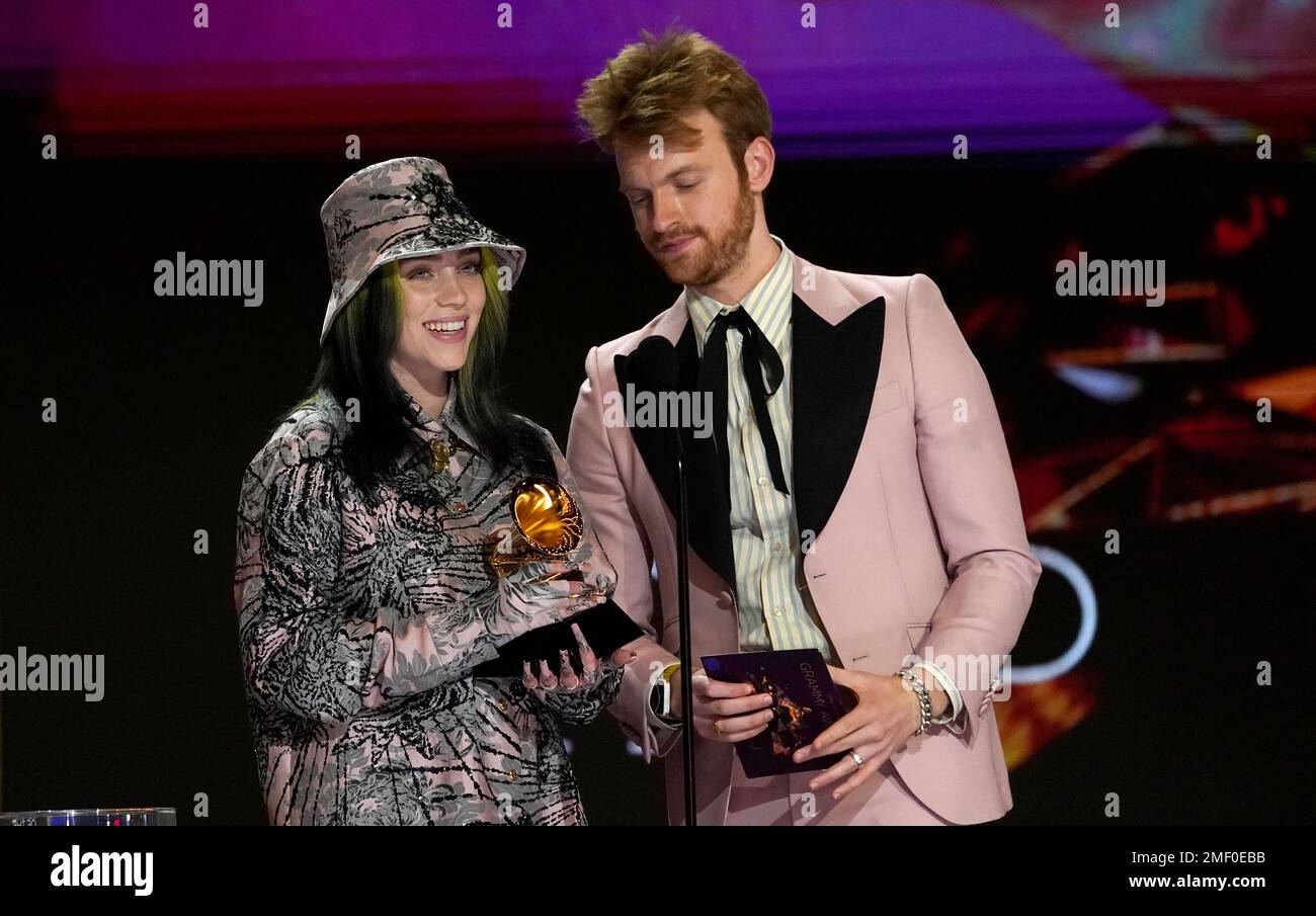 Billie Eilish, left, and Finneas accept the award for record of the ... Billie Eilish, left, and Finneas accept the award for record of the ...