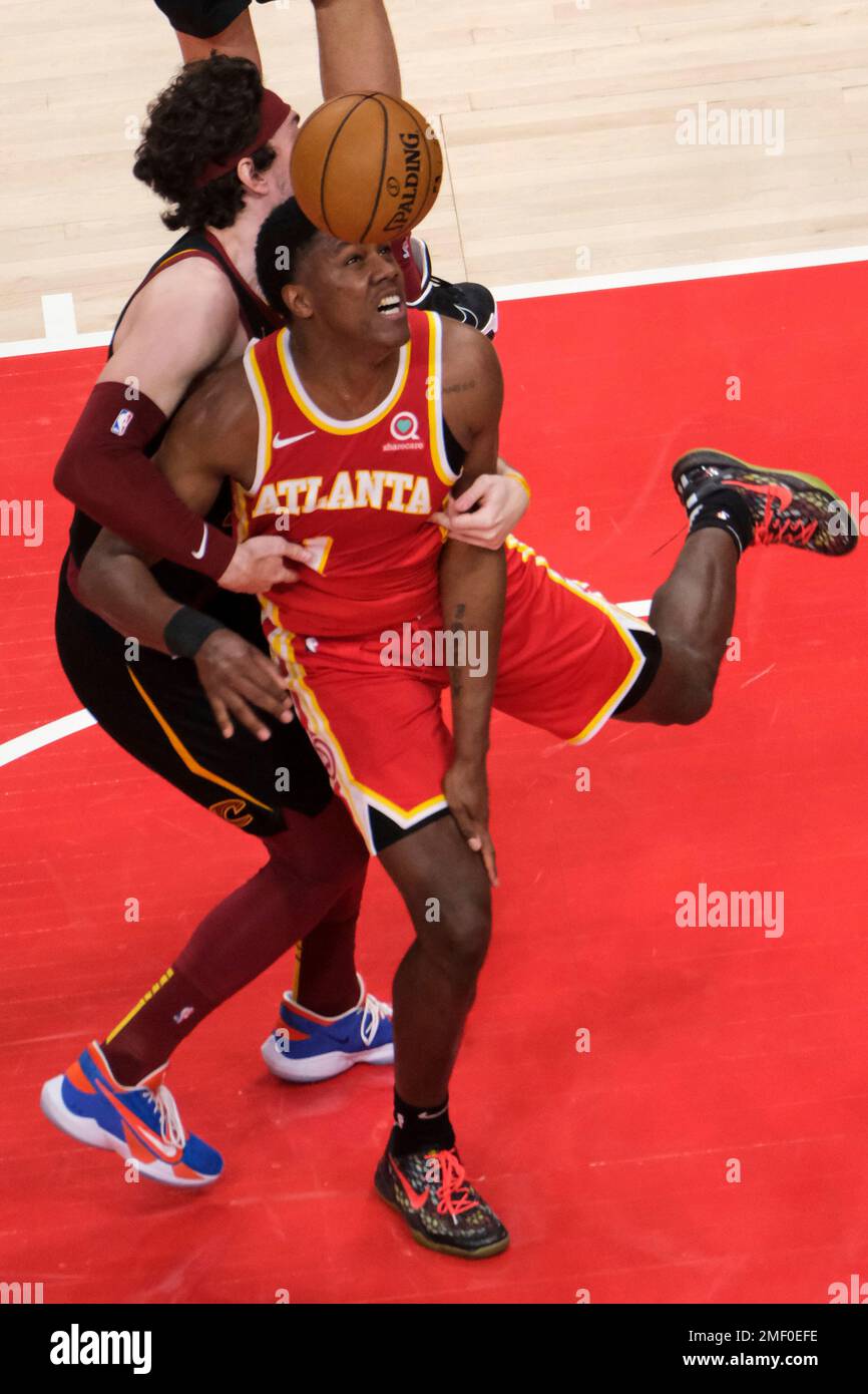 Cleveland Cavaliers forward Cedi Osman, left, fouls Atlanta Hawks ...