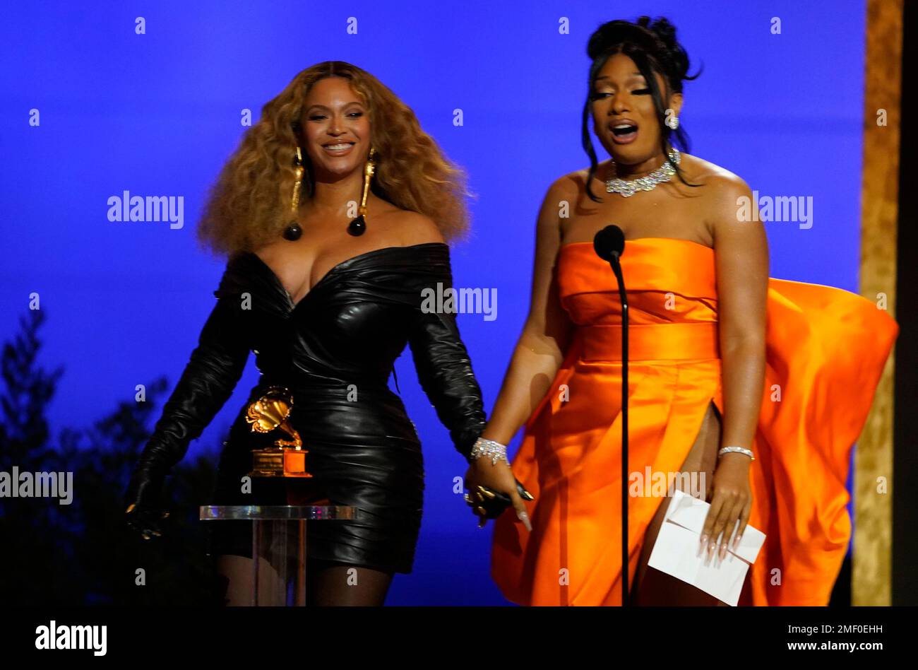 Beyonce, left, and Megan Thee Stallion accept the award for best rap ...