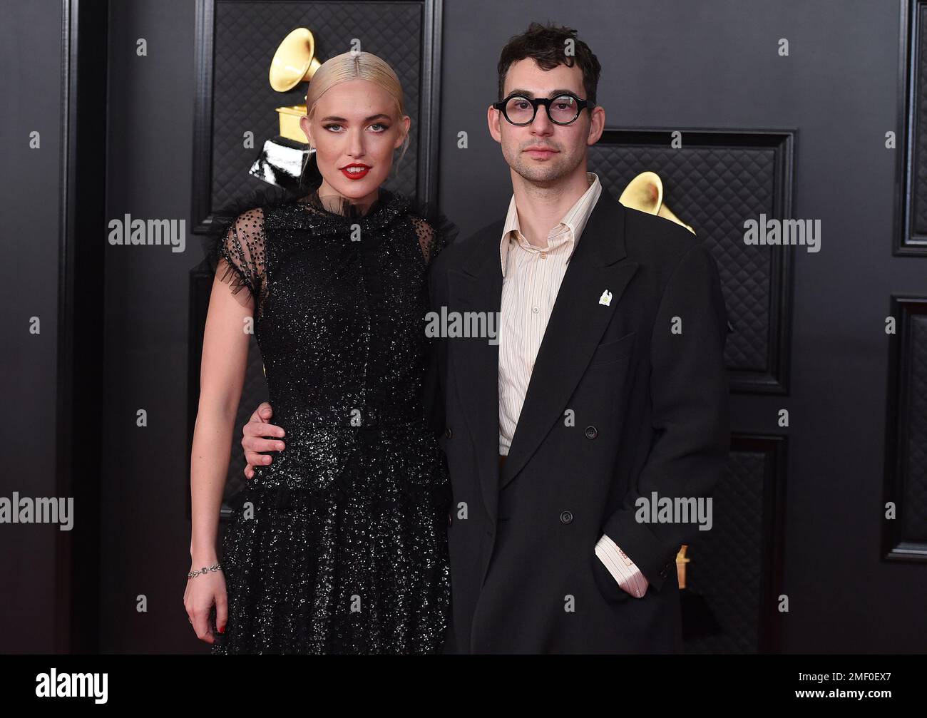 Carlotta Kohl, left, and Jack Antonoff pose in the press room at the ...