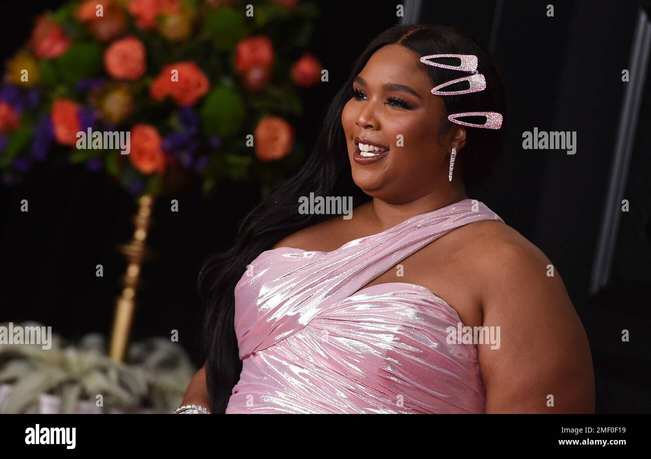 Lizzo poses in the press room at the 63rd annual Grammy Awards at the ...