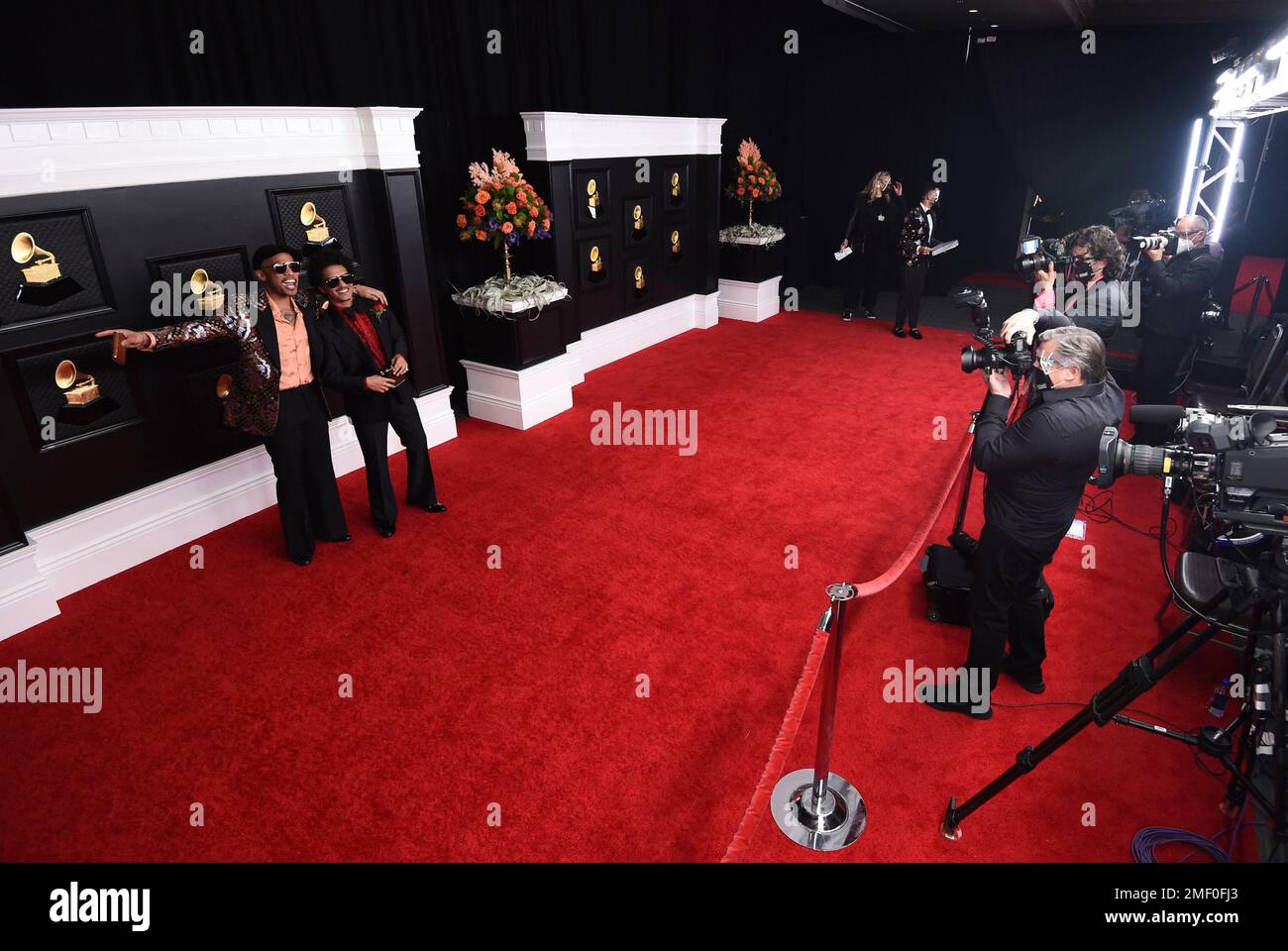 Anderson .Paak, left, and Bruno Mars arrive at the 63rd annual Grammy ...
