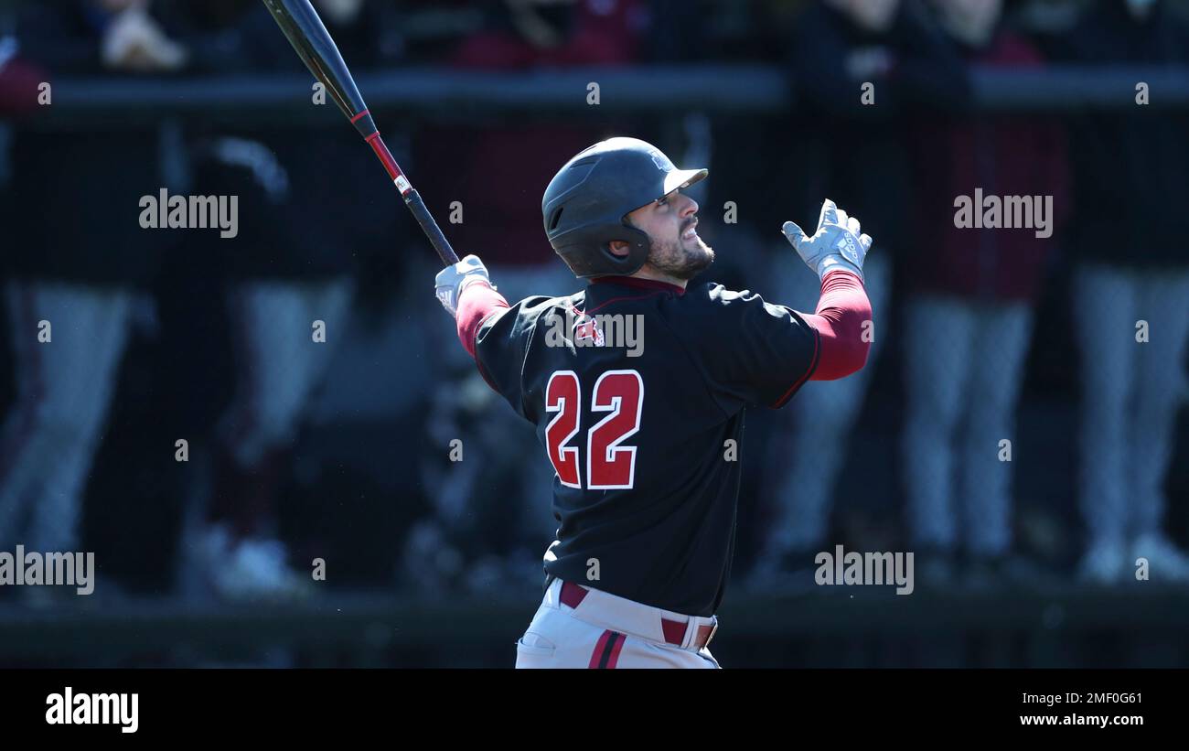 UMass catcher Dylan Judd swings at a pitch during an NCAA baseball game ...