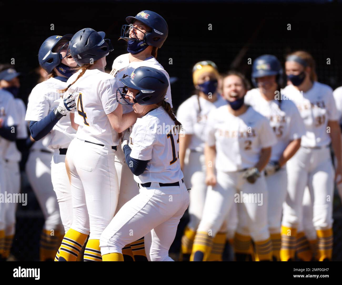 Drexel's Linda Rush (top smiling) is congratulated by her teammates ...
