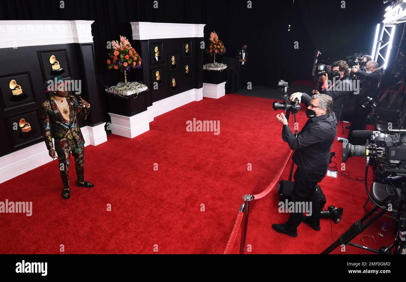 DaBaby poses for photographers as he arrives at the 63rd annual Grammy ...